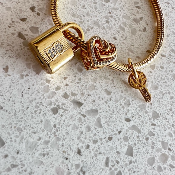 Pandora | Jewelry | Gold Pandora Bracelet | Poshmark